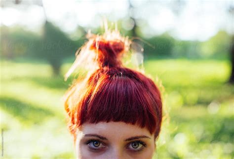 Redhead Woman In The Park By Stocksy Contributor Mosuno Stocksy