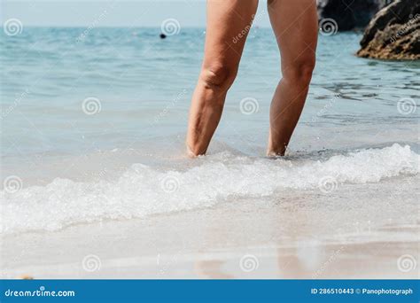 Sea Beach Travel Woman Walking On Sand Beach Leaving Footprints In