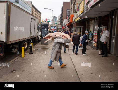 Delivery Of Pig Carcasses To An Eatery In Chinatown New York City Usa
