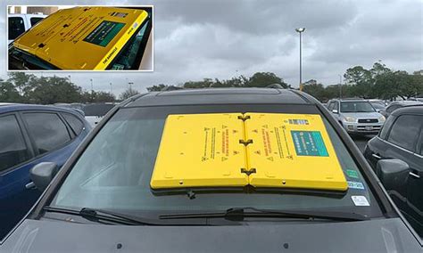 Barnacle Is Clamped Onto Windshield And Blocks View For Drivers With