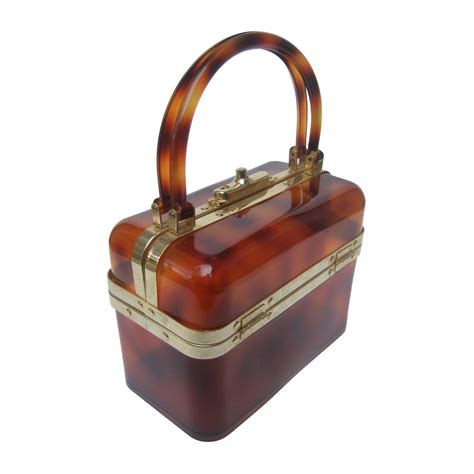 Sleek Tortoise Shell Lucite Handbag Made In France C 1970 For Sale At