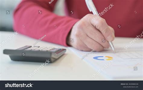 Hands Old Man Calculating Calulator Paperwork Stock Photo Shutterstock