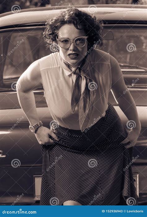 Attractive Pinup Girl Posing Beside Retro Car Mercedes Benz Stock Image