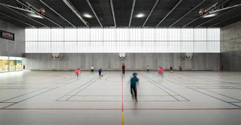 Glass Walls Create Visual Connection Between Strasbourg Sports Hall And Its Surroundings