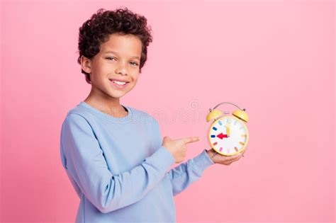 Photo Of Handsome Good Mood Grandson Wear Blue Sweater Pointing Clock