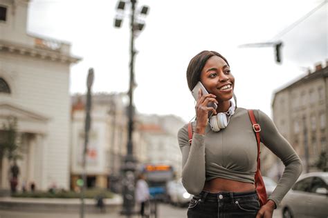 Selective Focus Photo Of Smiling Woman In Gray Long Sleeve Shirt And