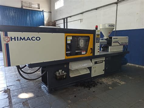 INJETORA DE PLASTICOS HIMACO RAPID 1300 740 LH ANO 2004 Operatrix