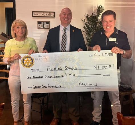 Flushing Rotary Club Presents Fundraising Check To Flushing Community