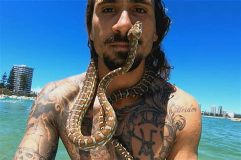 Dont Take Your Python Surfing Man Fined Over Viral Stunt