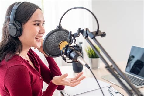 Asian Woman Is Speaking To Encourage On A Radio Broadcasting Station