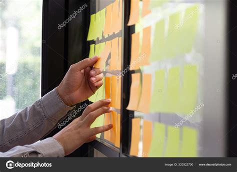It Worker Tracking His Tasks On Kanban Board Using Task Control Of Agile Development