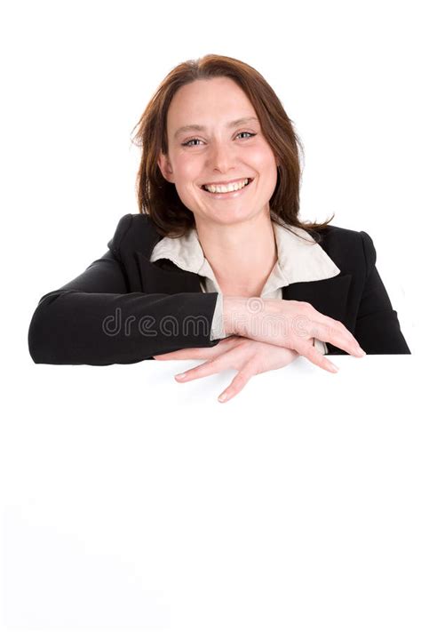 Muchacha Sonriente Con La Muestra En Blanco En Blanco Foto De Archivo