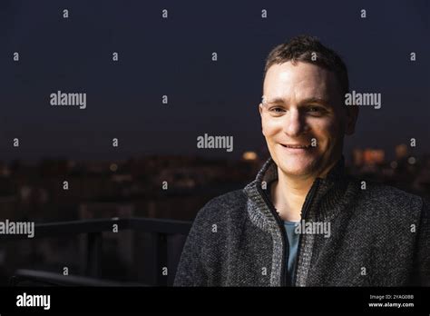 Attractive Forty Year Old White Man Making A Selfportrait At Night