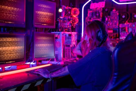 Premium Photo Woman Hacker Sitting In Front Of A Computer Typing On