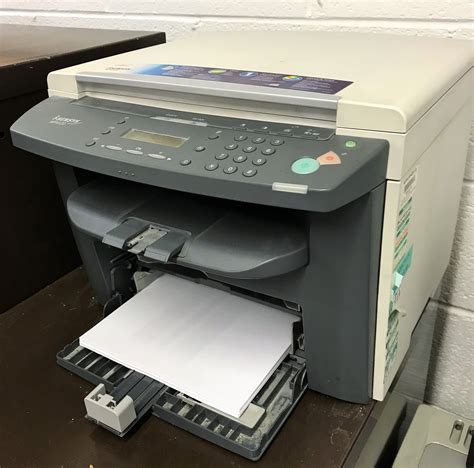 A Canon i-SENSYS MF4120 Multi Function Printer.