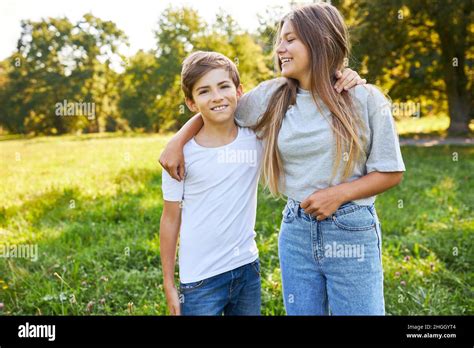 Teenage Brother And Sister Hugging