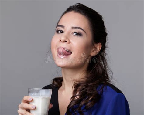 Young Brunette Licking Milk From A Goblet Stock Image Image Of