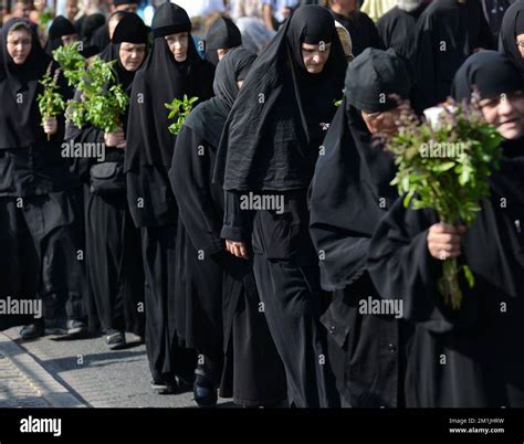 Orthodox Christian Nuns Walking In A Procession From Tomb Of The Virgin