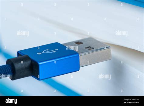 Macro Of Usb Cable Connected To Book Stock Photo Alamy