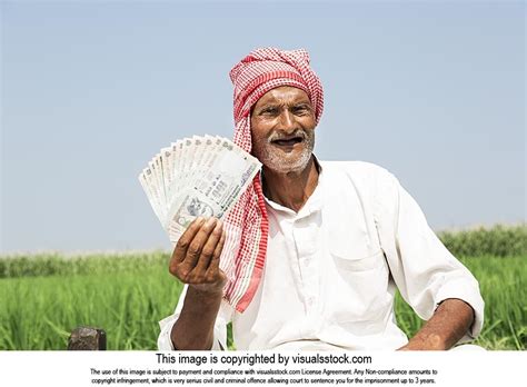Indian Rural Farmer Old Man Showing Money Rupees Sitting Field