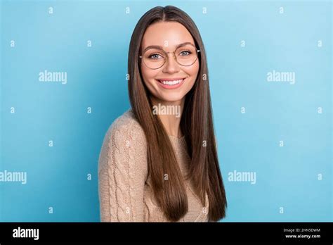 Portrait Of Attractive Cheerful Charming Girl Nerd Wearing Specs Isolated Over Bright Blue Color