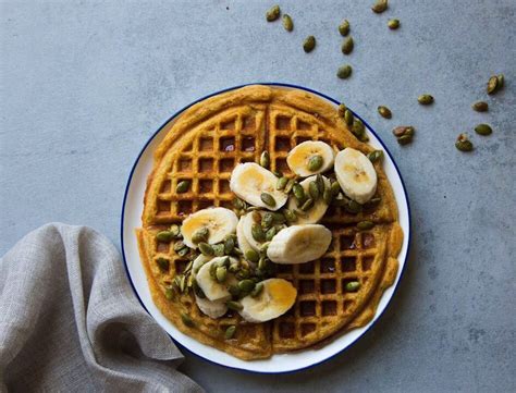 Gluten Free Pumpkin Waffles With Banana And Candied Pumpkin Seeds