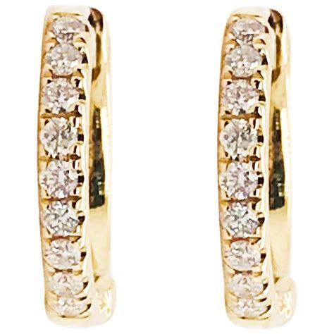 Diamond Huggie Earrings 14 Karat Gold 15 Carat Diamond Mini Hoops Ear