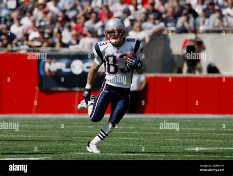 New England Patriots Wide Receiver Wes Welker Runs With The Ball During