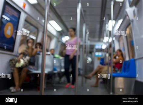 Abstract Defocus Scene Of Passengers Riding A Commuter Train In Rio De