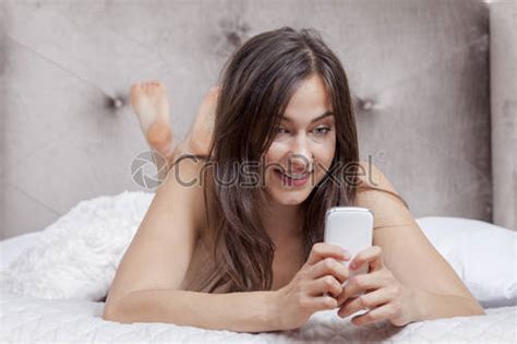 Naked Woman With Smart Phone Stock Photo Crushpixel