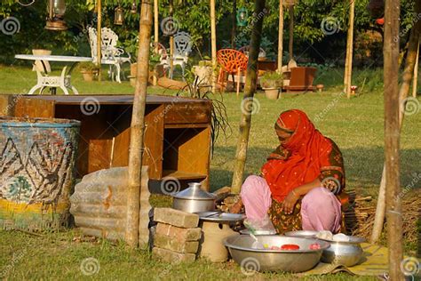Bangladeshi Women Making Pitha In Their Outdoor Kitchen Pitha Is The