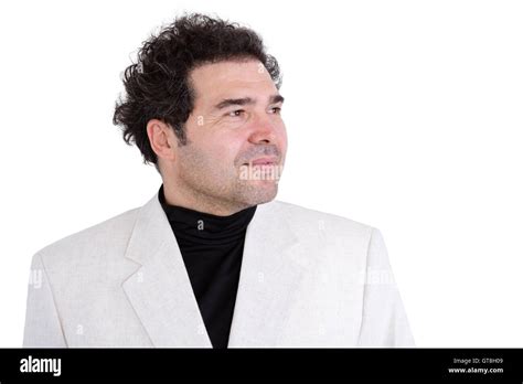 Slightly Grinning Confident Man With Curly Hair And Stubble Wearing
