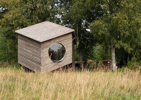 Six Sided Modular Cabin With Wooden Walls And Fisheye Windows