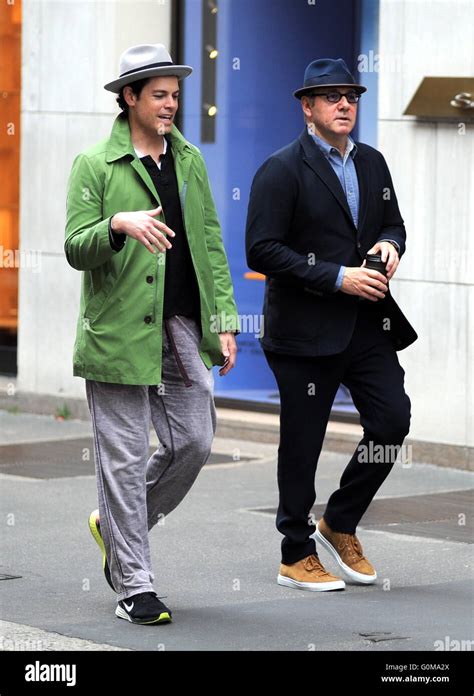 Kevin Spacey Takes A Stroll With A Friend Wearing A Suit Hat Glasses