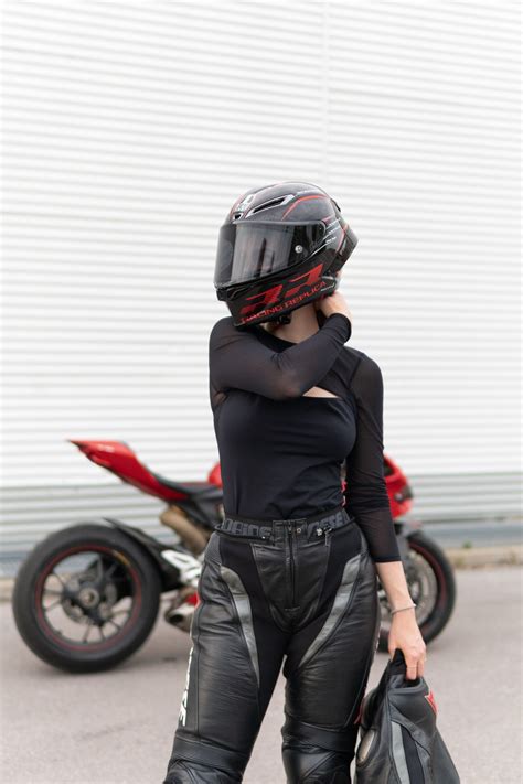 Elegant Biker Girl Wearing Dainese And An Agv Race Motorcycle Carbon