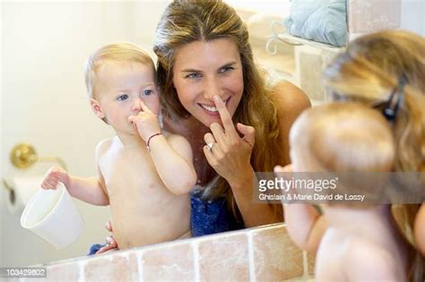 Woman Touching Daughters Nose Photos And Premium High Res Pictures