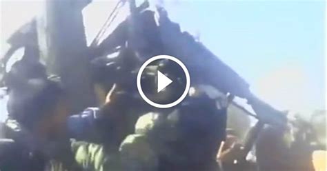 Watch Kashmiri Youth Rescued An Army Jawan Trapped Inside A Damaged