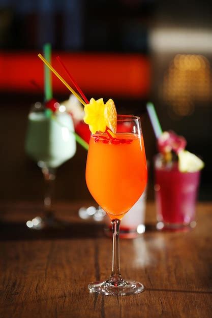 Premium Photo Glasses Of Cocktails On Bar Background