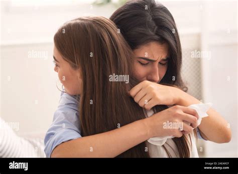 Girls Crying Together