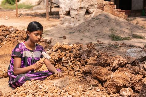 Young Girl Defecating At The Side Of The Temple Editorial Image