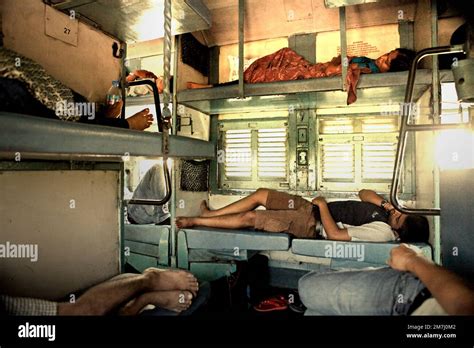 Passengers Sleeping In Sleeper Class Of The India Railway Service