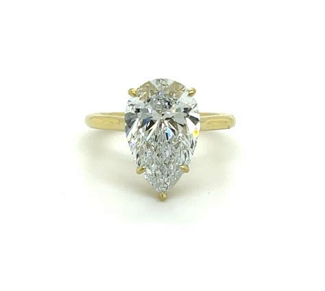 Pear Shaped Engagement Ring In Yellow Gold Peter Norman