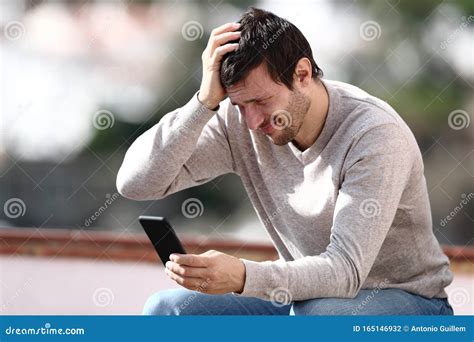Worried Man Checking Phone After Mistake Outdoors Stock Photo Image
