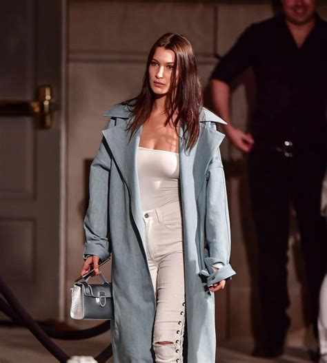 Bella Hadids White Lace Up Jeans At Fashion Week Popsugar Fashion