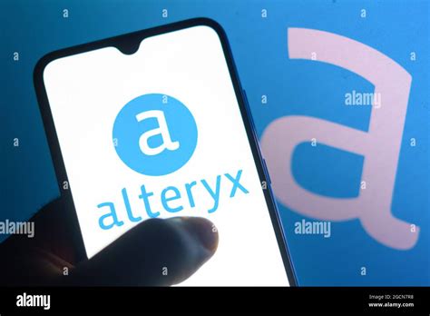 In This Photo Illustration The Alteryx Logo Seen Displayed On A
