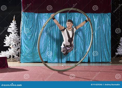 Circus Artist In A Cyr Wheel Stock Photo Image Of Arena Gymnastics