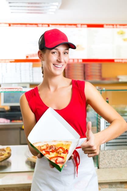 Premium Photo Woman Eating A Slice Of Pizza