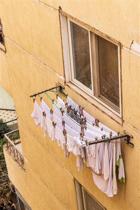 Laundry Hung To Dry Outside A Window In Giza Egypt Stock Image Image Of East Pyramid 258180795