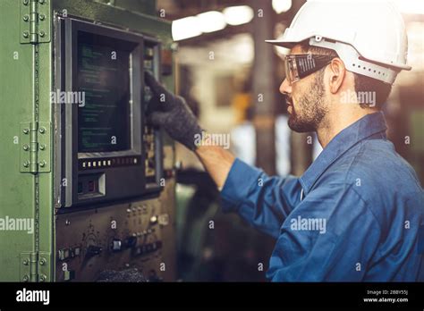 Worker Operate Cnc Machine With G Code Monitor High Skill Labor Work Industry With Safety