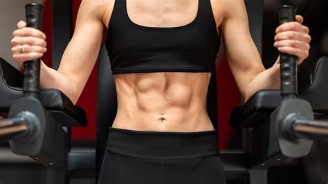 Woman With Visible Abs Doing Fitness Free Photo